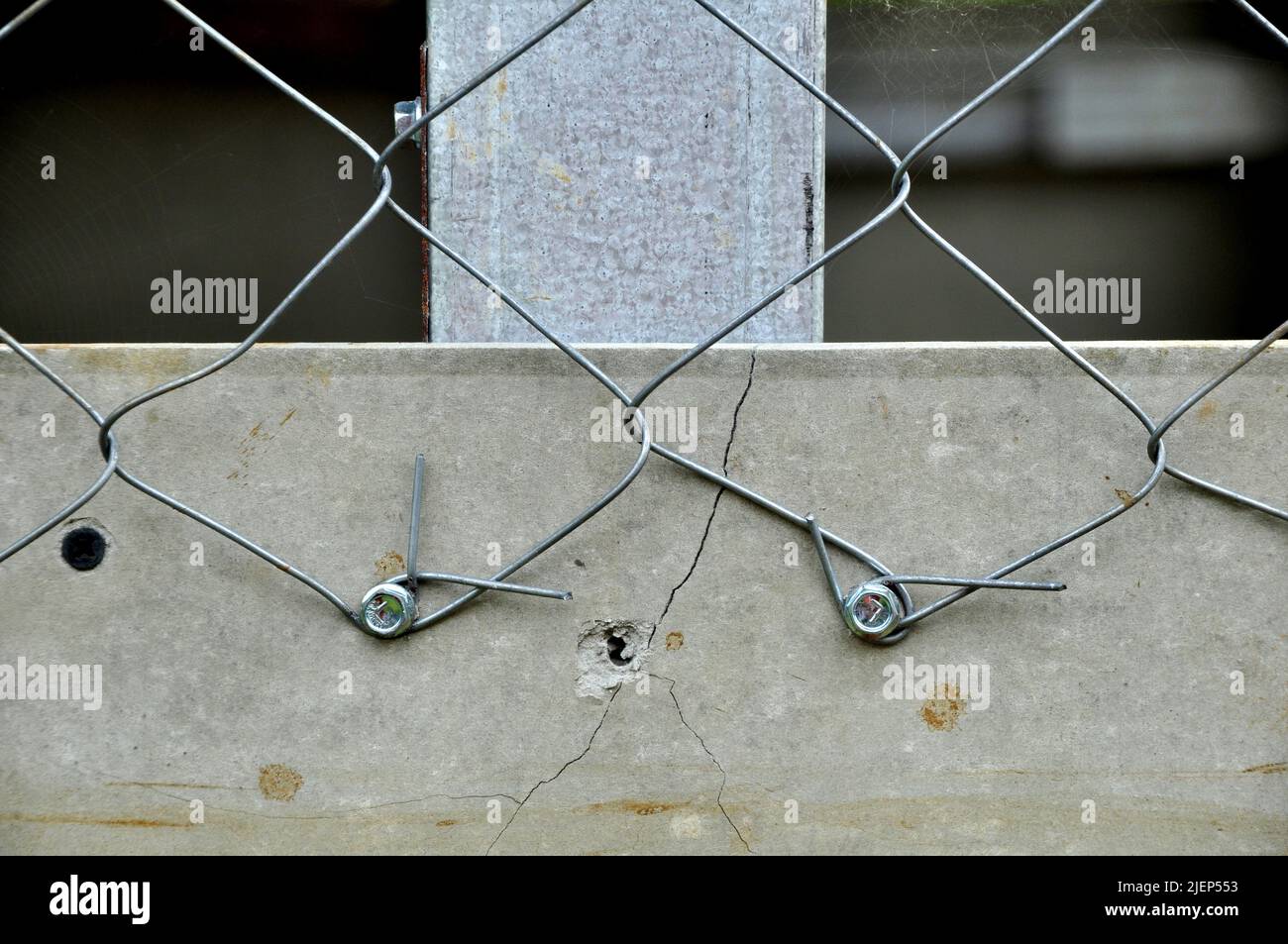 Home yard fence security wire Stock Photo - Alamy