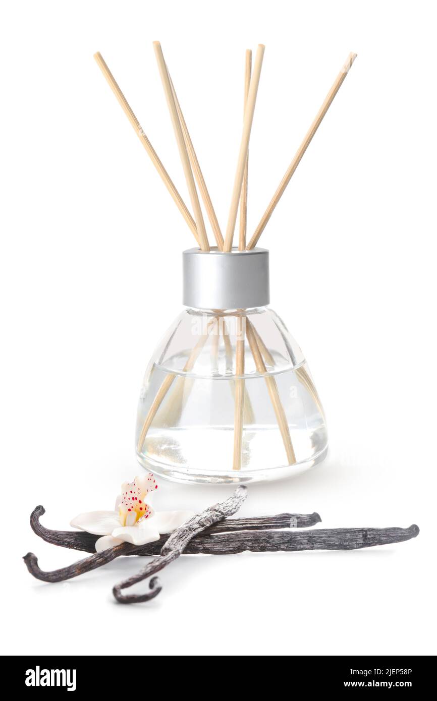 Reed diffuser and vanilla on white background Stock Photo - Alamy