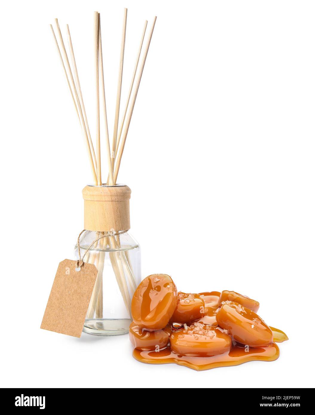 Reed diffuser and caramel on white background Stock Photo - Alamy