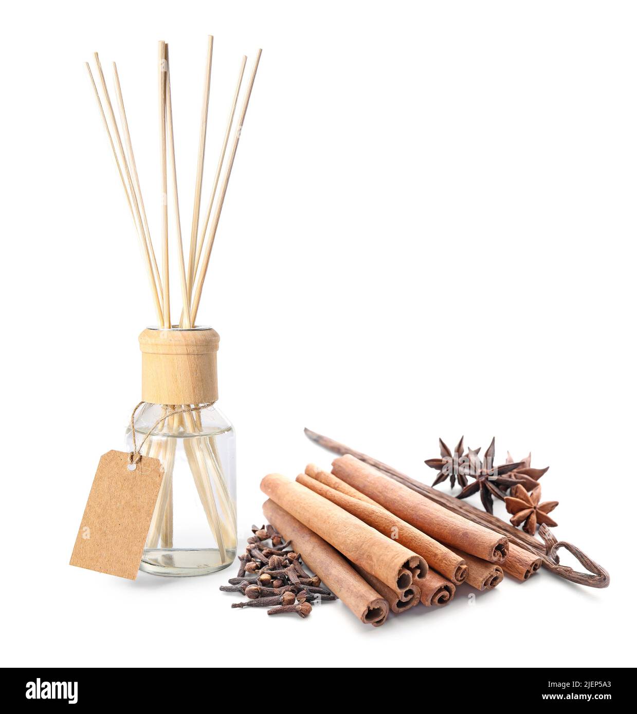 Reed diffuser and spices on white background Stock Photo - Alamy