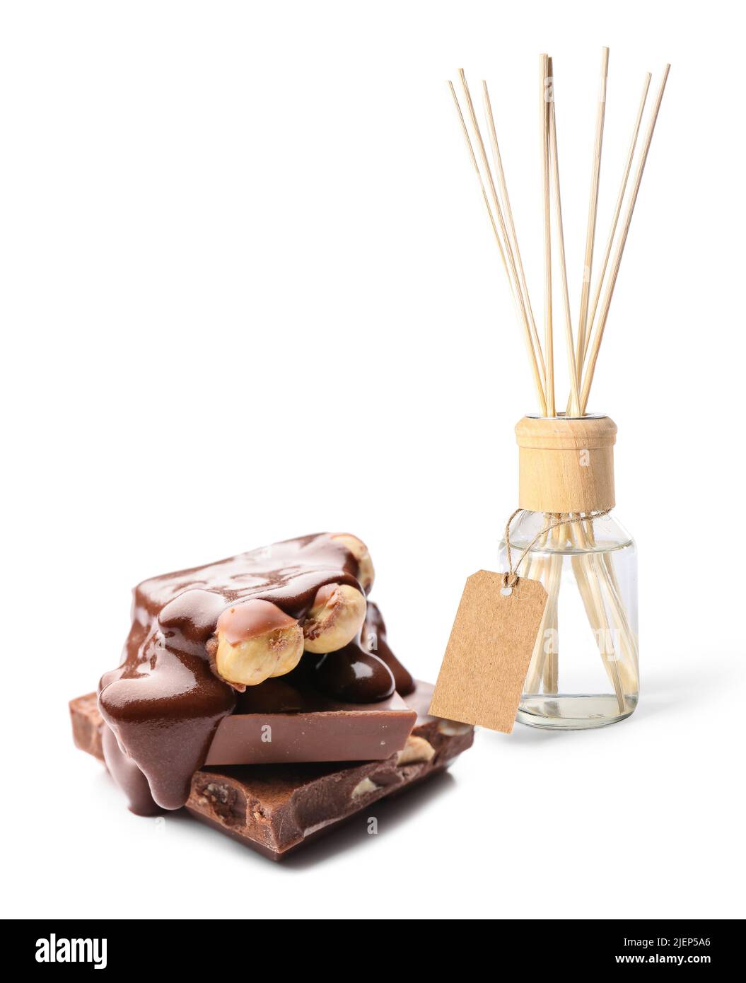 Reed diffuser and chocolate on white background Stock Photo - Alamy