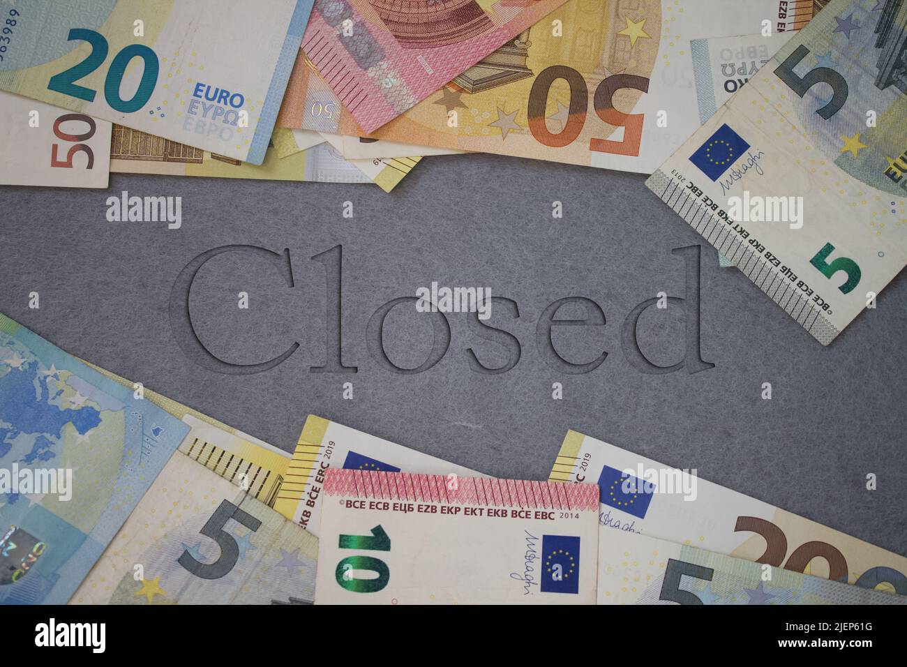 Closed word with money. Paper currency background with different ...