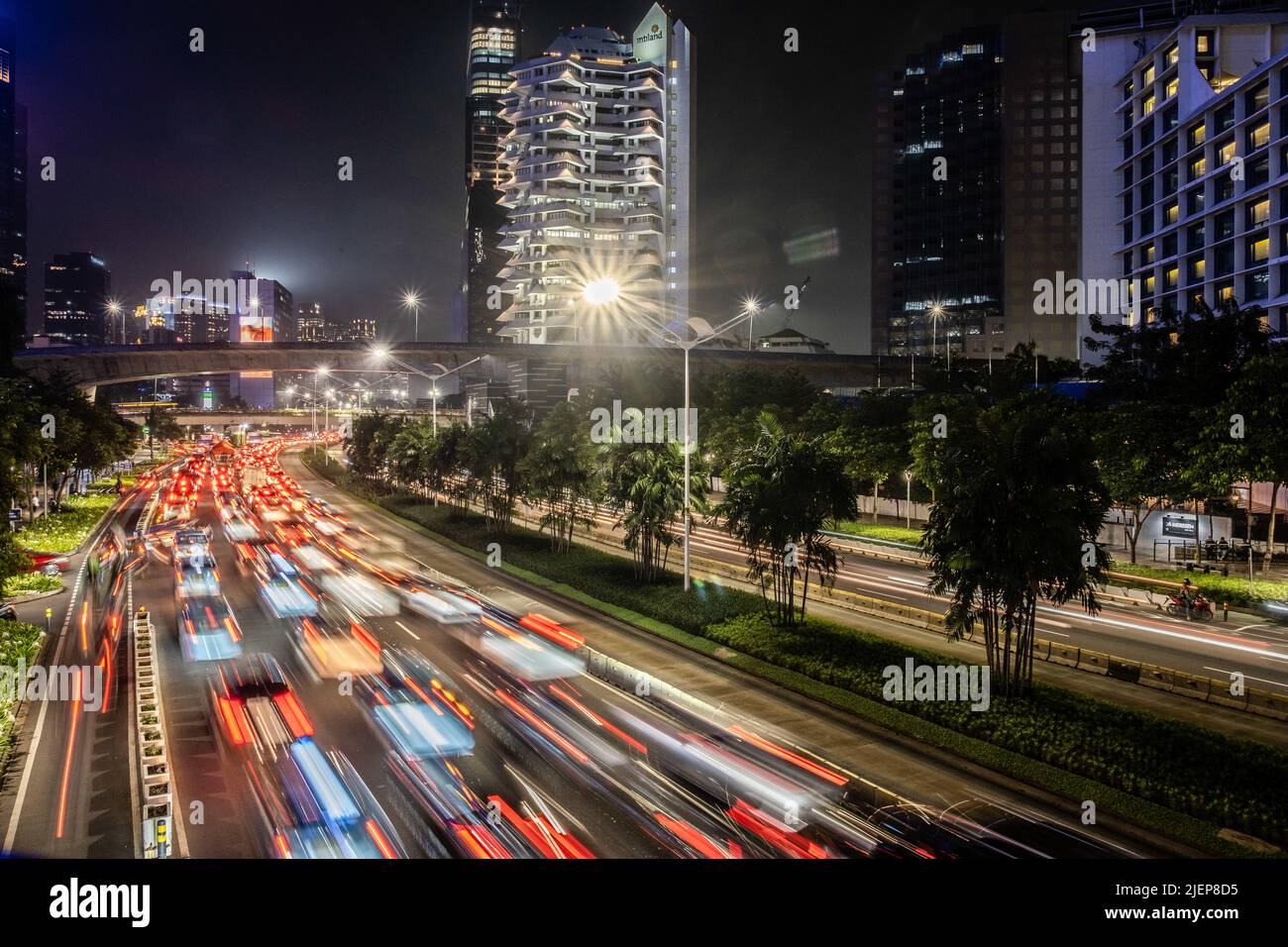 Jakarta, Indonesia. 16th June, 2022. The bustle of vehicles crossing the streets of the Sudirman ...