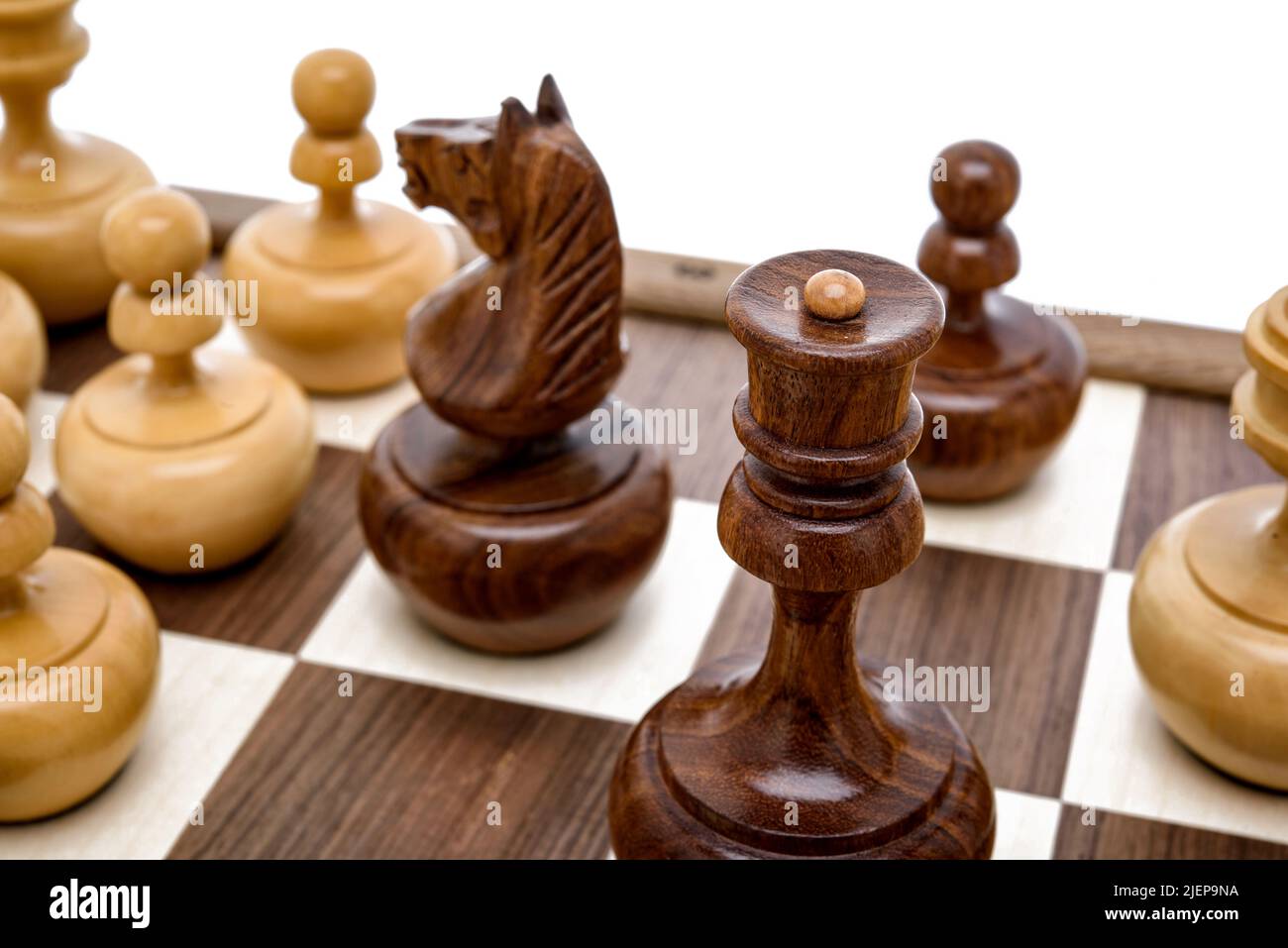 Beige Brown Wooden chess different pieces figures standing on ...