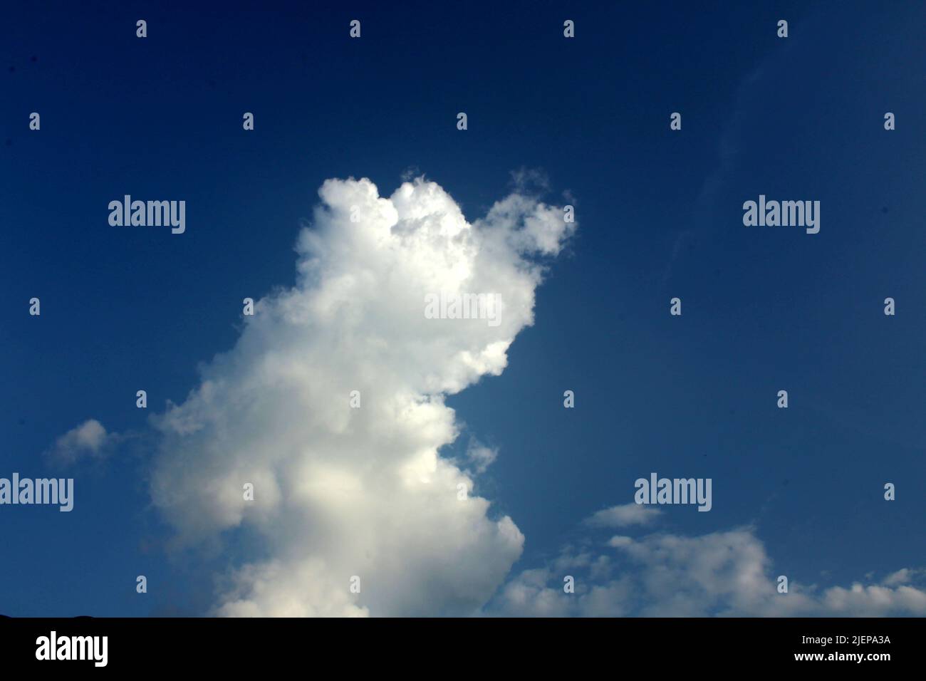 sun rays coming out from clouds Stock Photo - Alamy