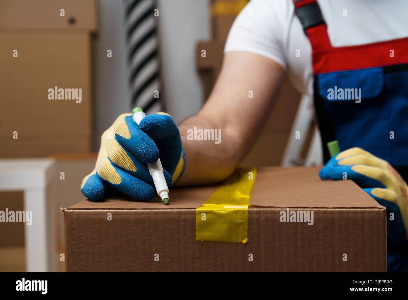 Man mover in uniform hi-res stock photography and images - Alamy
