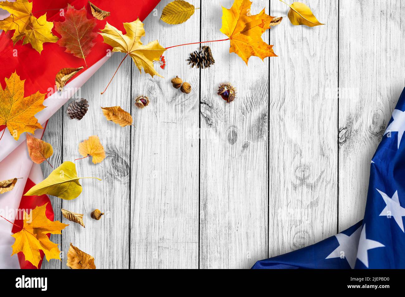 fall leaves sit on on American flag Stock Photo - Alamy
