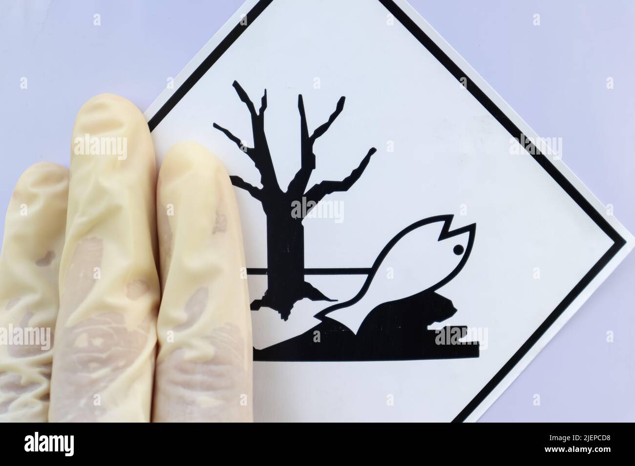 Labeling a sign on a chemical tank Stock Photo - Alamy