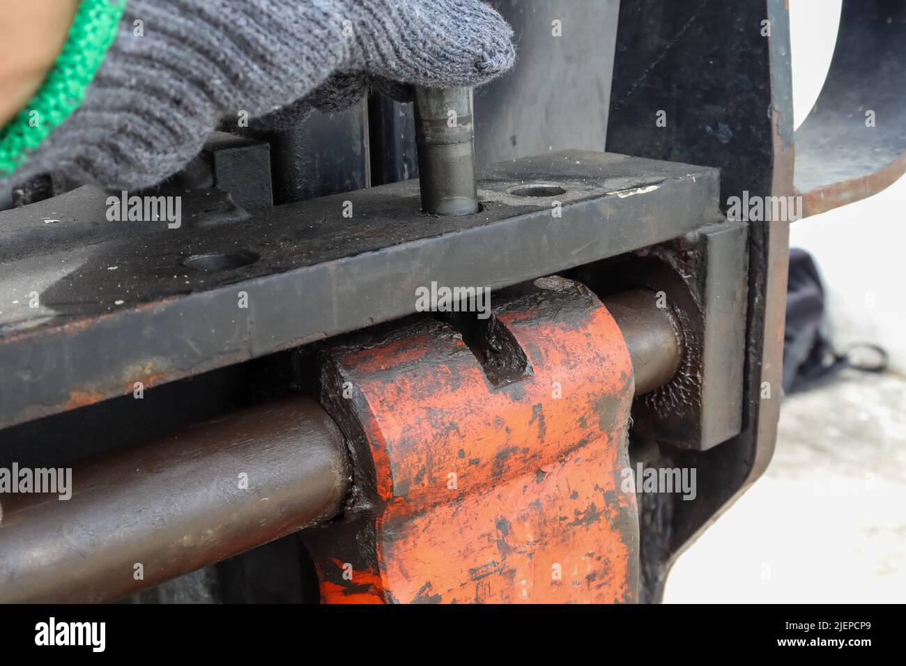 Lock fork of forklift before work Stock Photo - Alamy