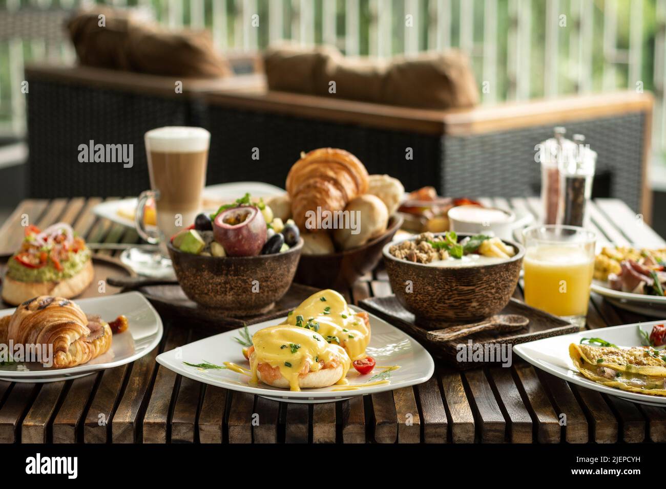 many mixed western breakfast food items on cafe table Stock Photo - Alamy