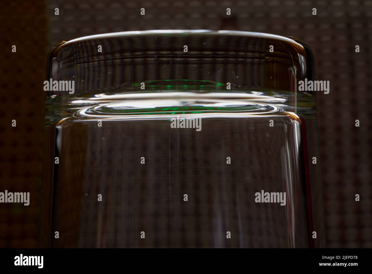 Glass made of crystal-like materials photographed in the studio with ...