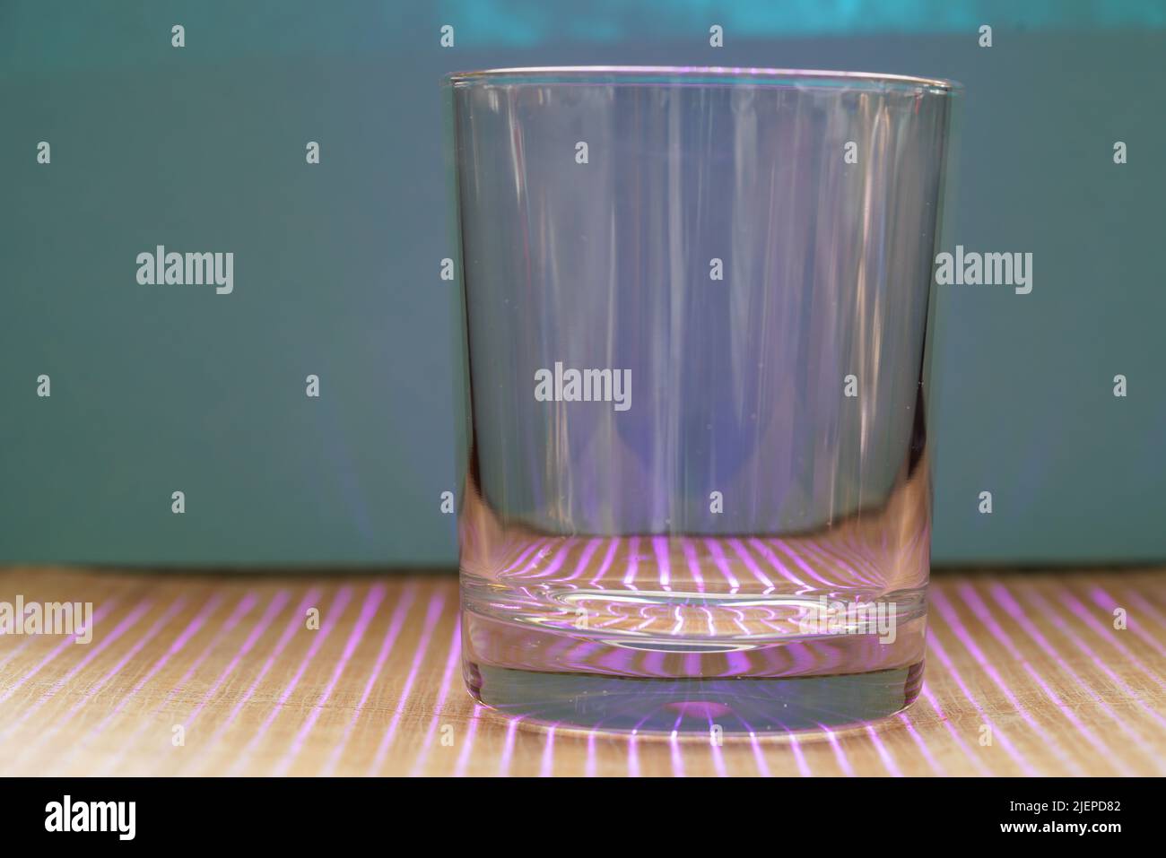 Glass made of crystal-like materials photographed in the studio with ...