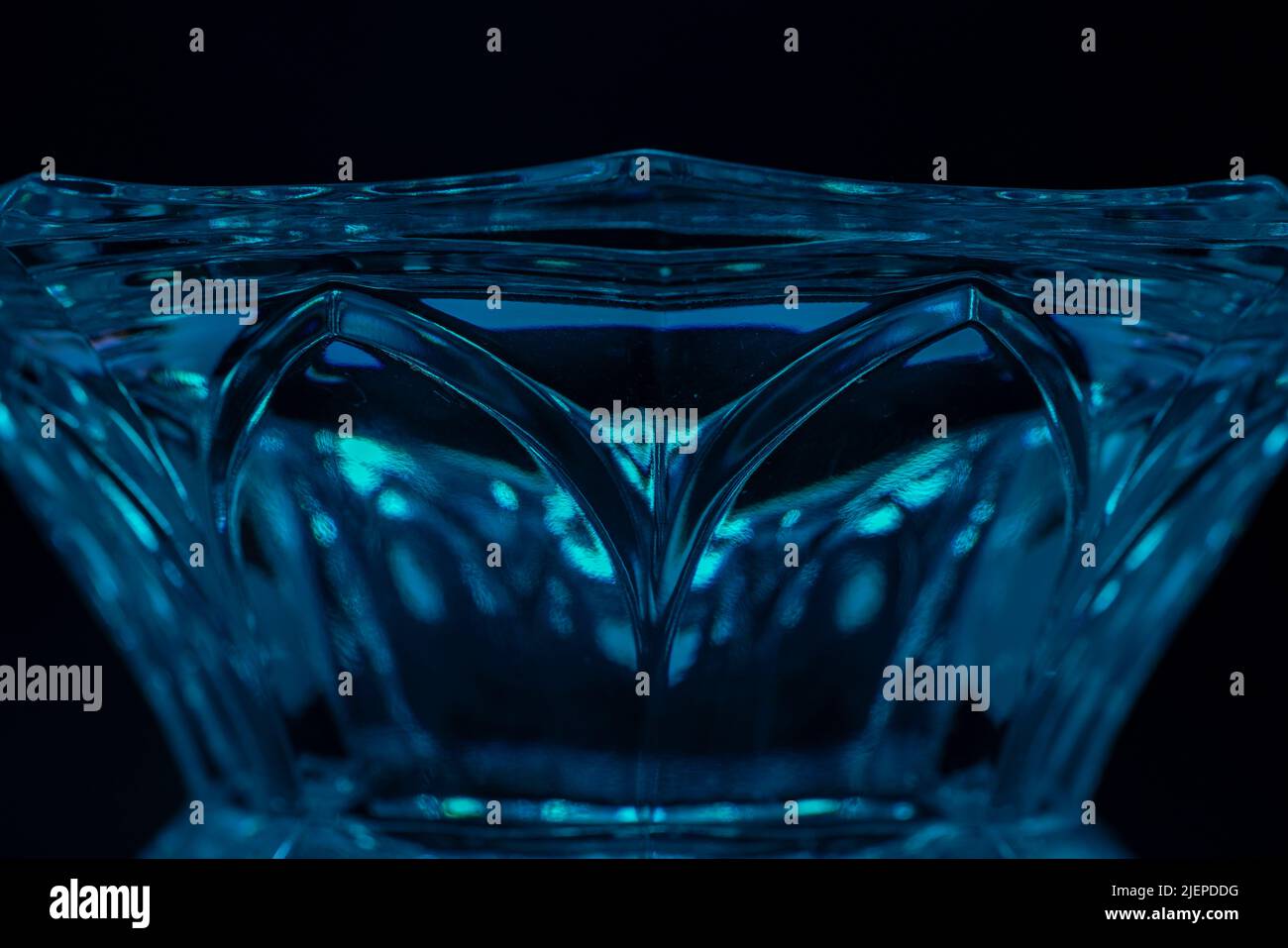 Glass made of crystal-like materials photographed in the studio with ...