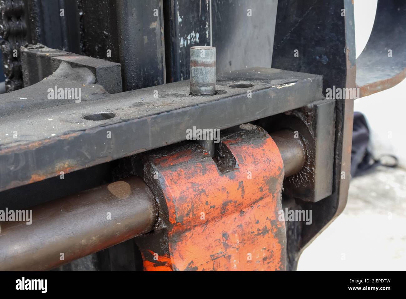 Lock fork of forklift before work Stock Photo - Alamy