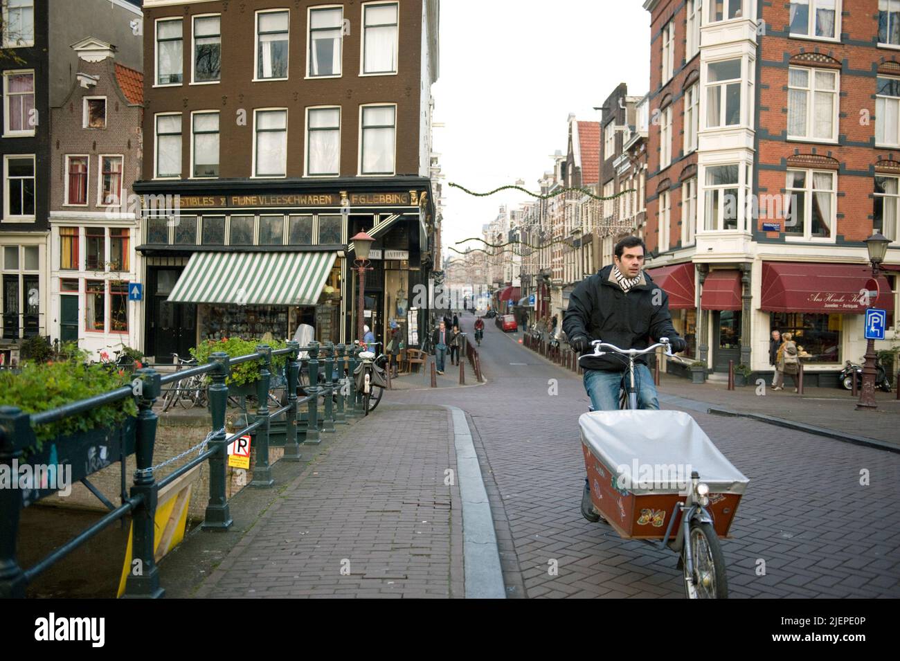 Amsterdam, Netherlands. Young adult, Caucasian Male riding his Bike ...