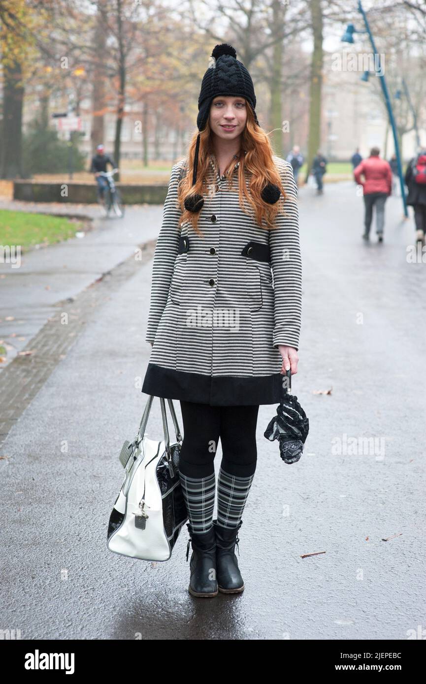 Breda, Netherlands. Portrait of a young adult, red headed woman ...