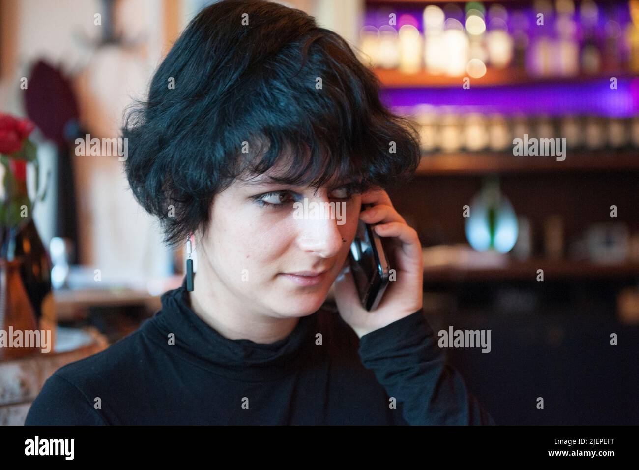 Tilburg, Netherlands. Young adult caucasian woman performing an ...