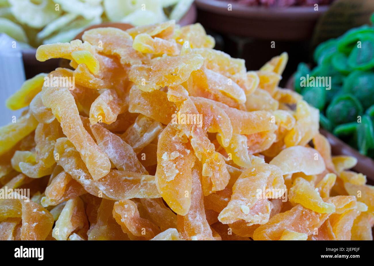 Bowl with dried melon fruit. Slices displayed at street market stall ...