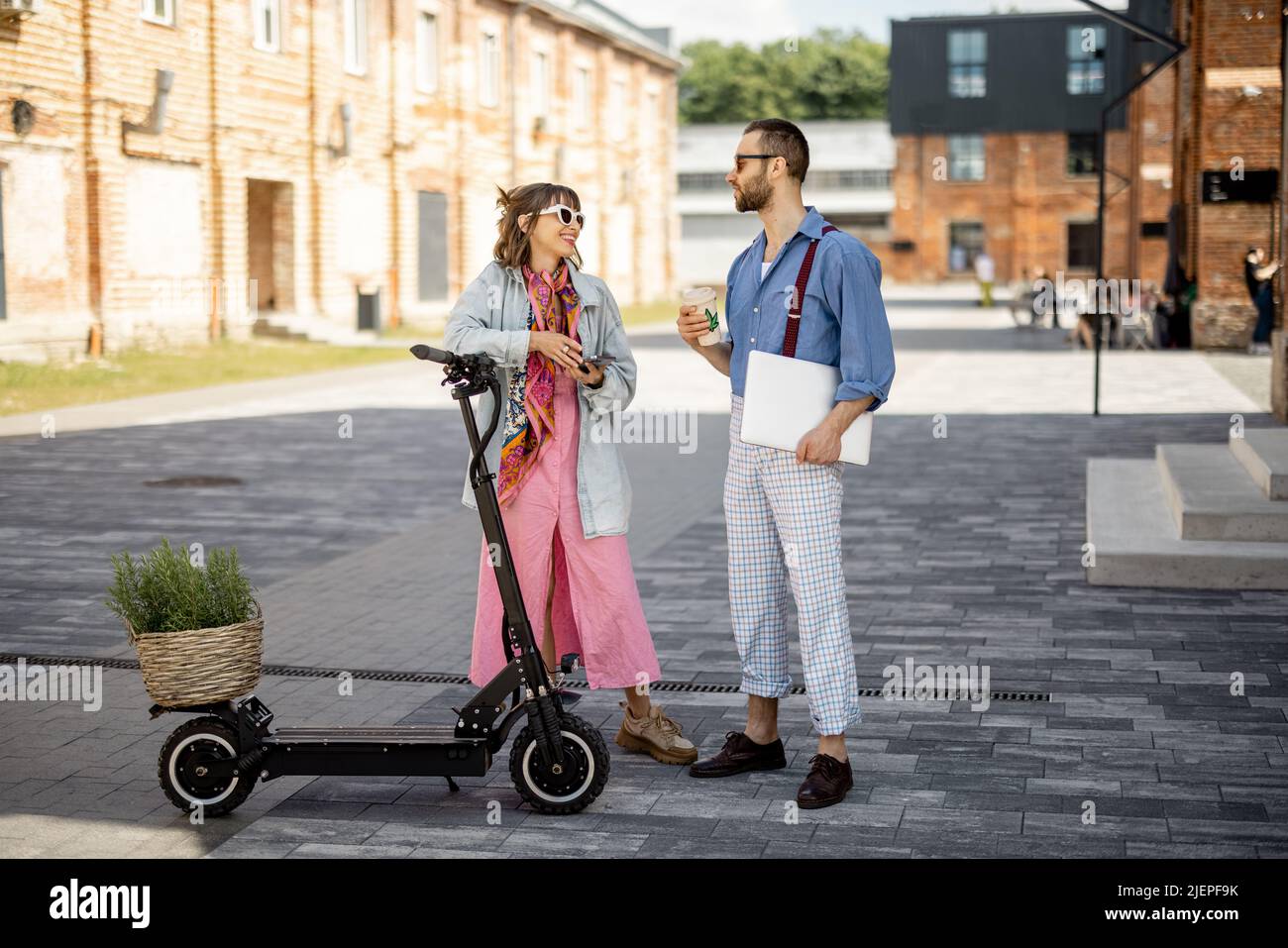 Stylish colleagues meet together outdoors Stock Photo - Alamy