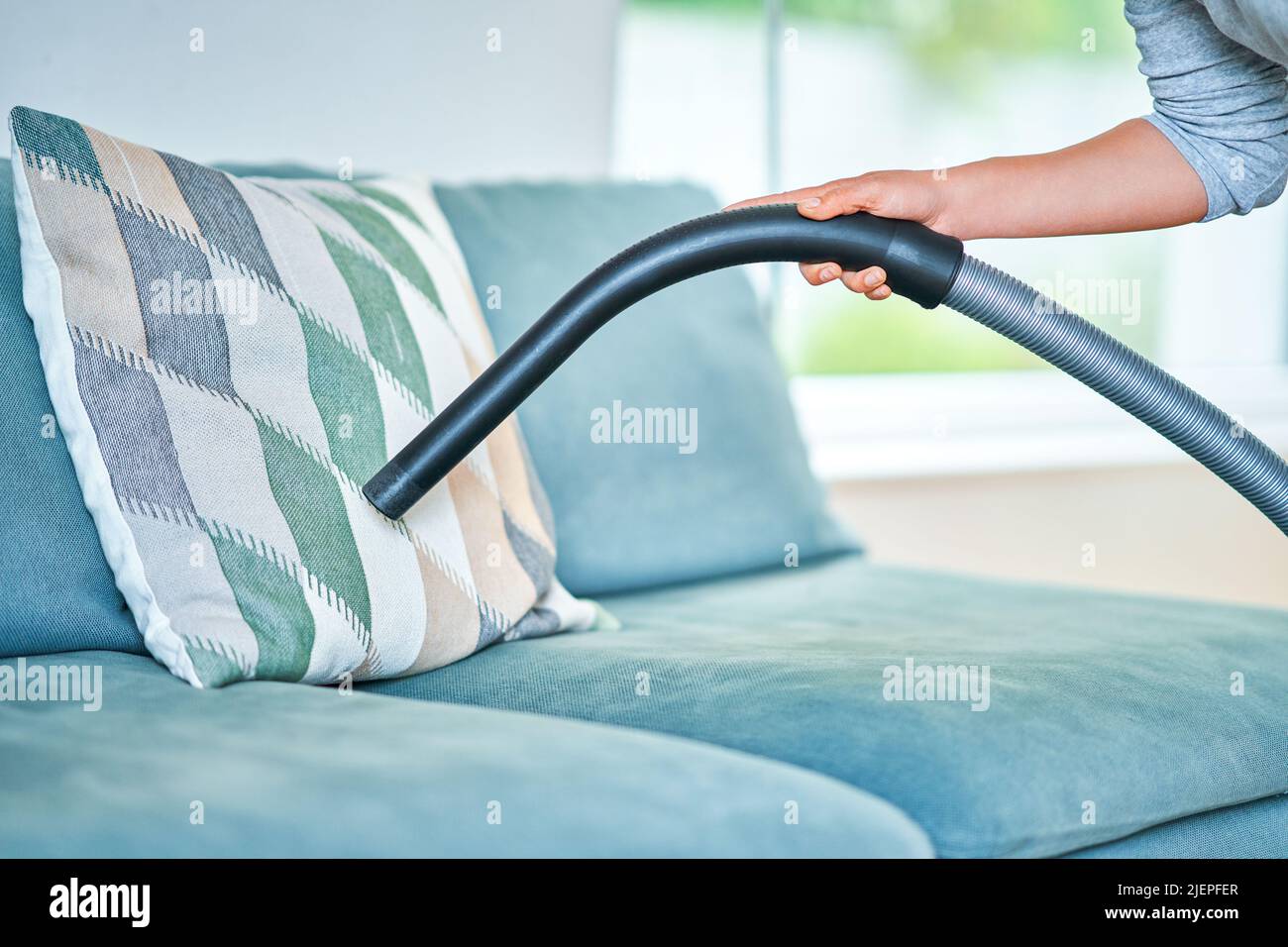 Picture of woman cleaning house using vacuum Stock Photo - Alamy