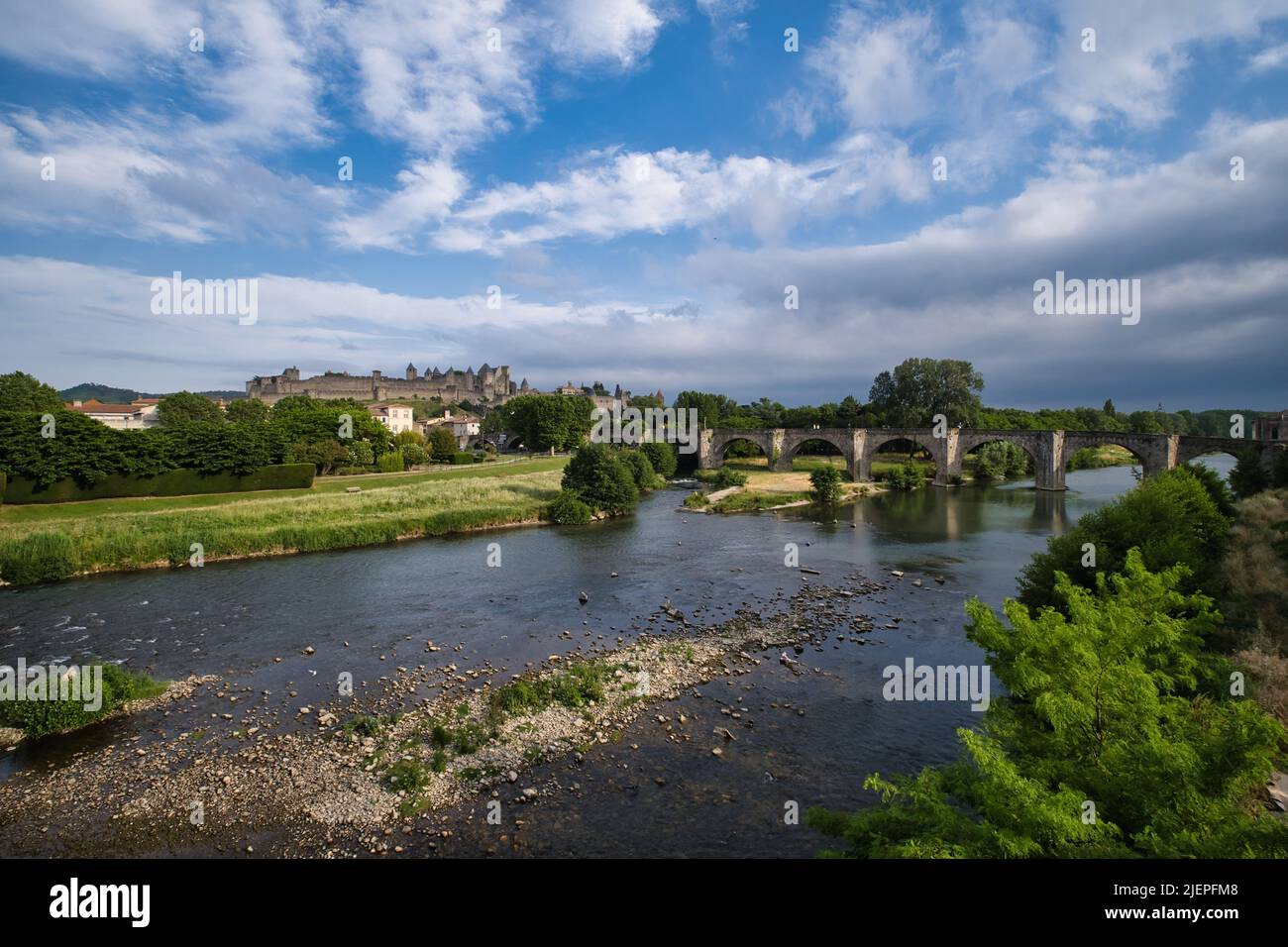 View of the Aude river with the Pont Vieux bridge and the medieval ...