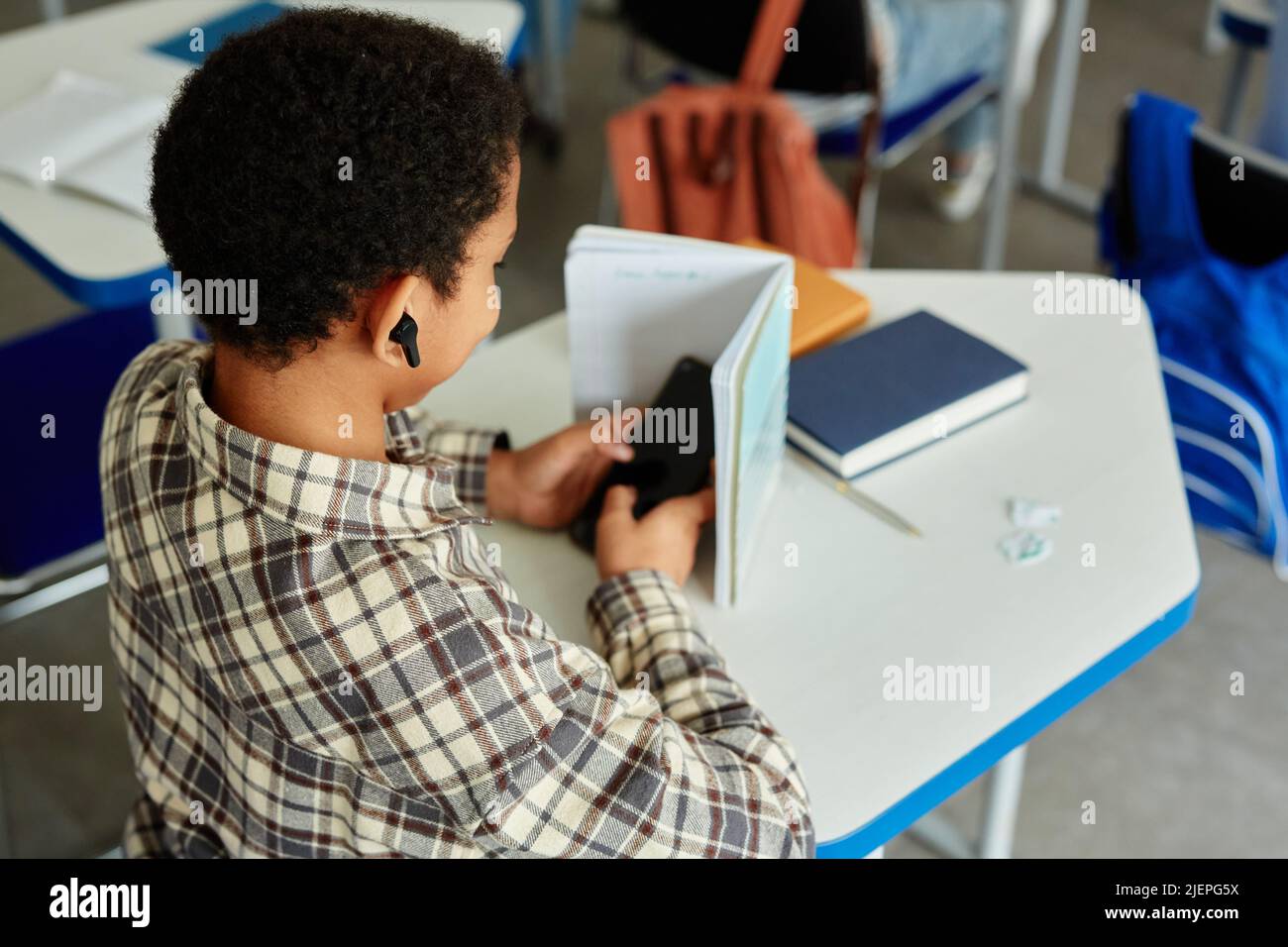 African boy class note hi-res stock photography and images - Alamy