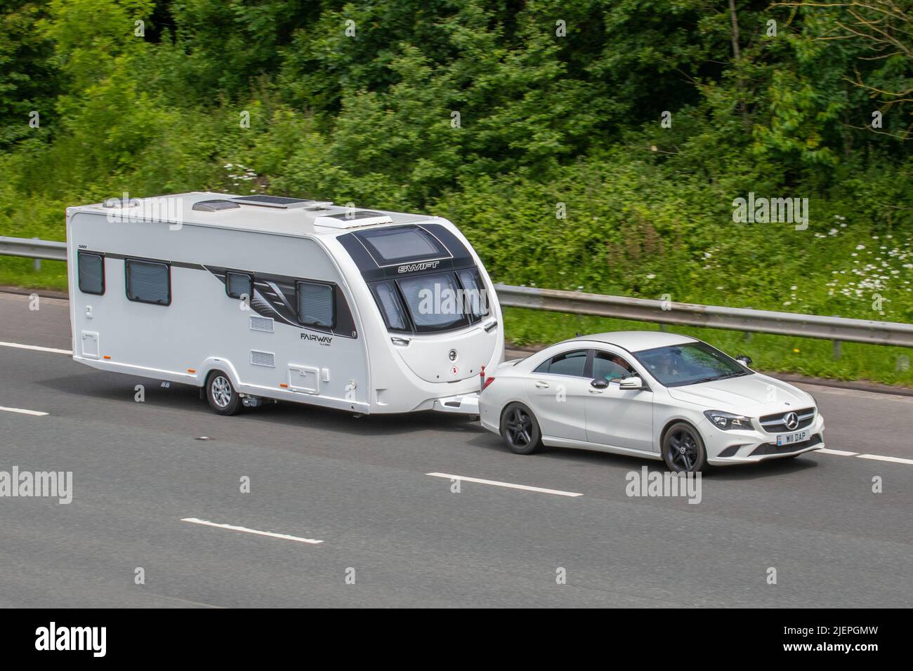 Swift Fairway Classic 580 being towed by 2014 Mercedes Benz CLA CLA220 ...