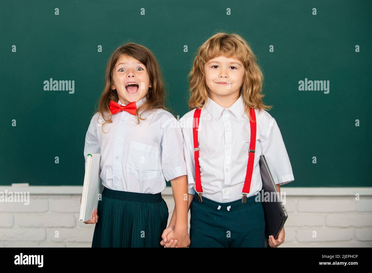 Back to school. Schoolchild friends back to school at knowledge day ...