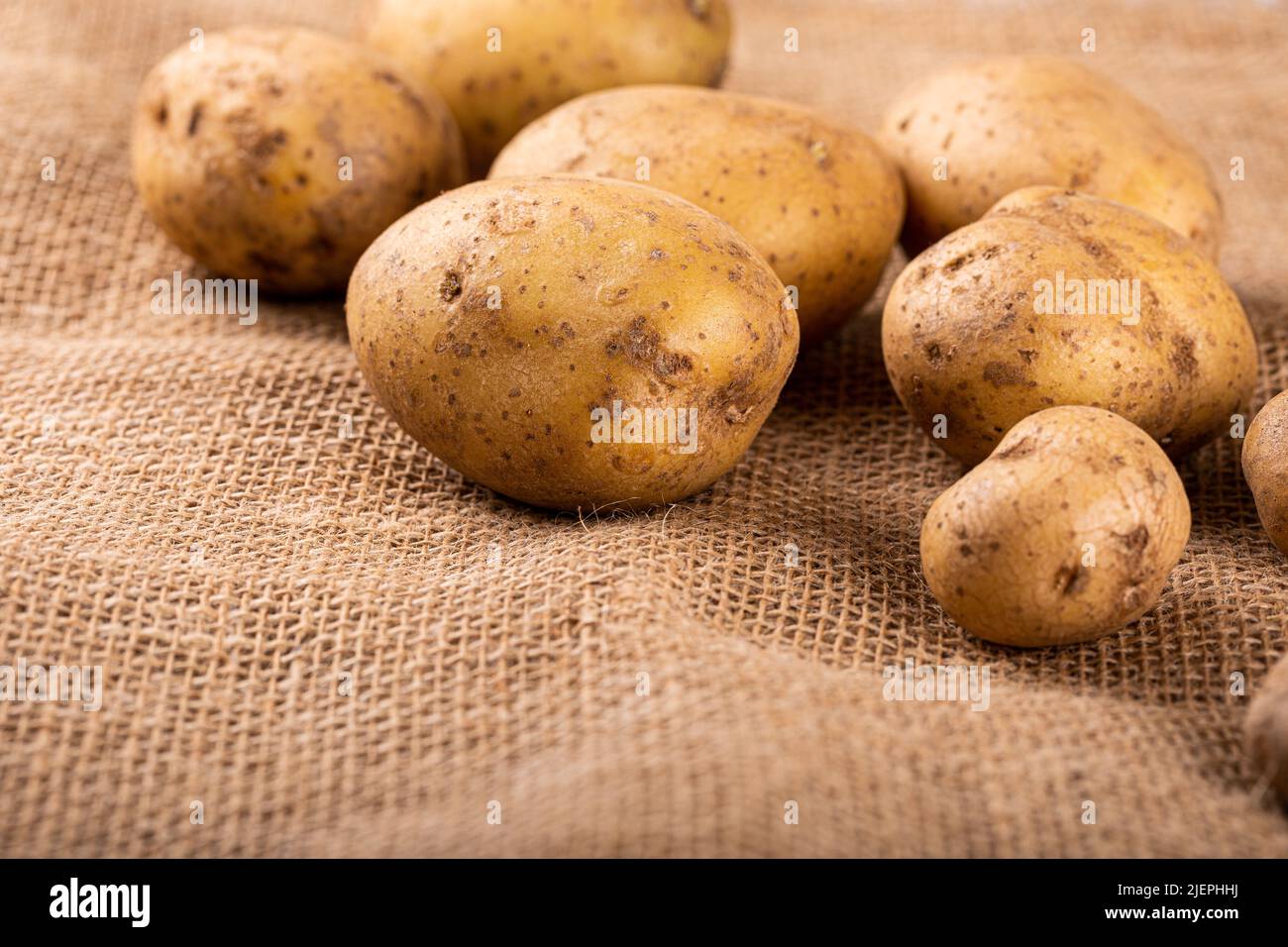Raw whole washed organic potatoes Stock Photo - Alamy