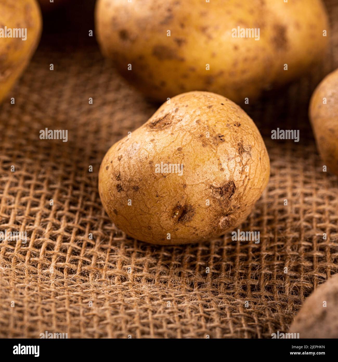 Raw whole washed organic potatoes Stock Photo - Alamy
