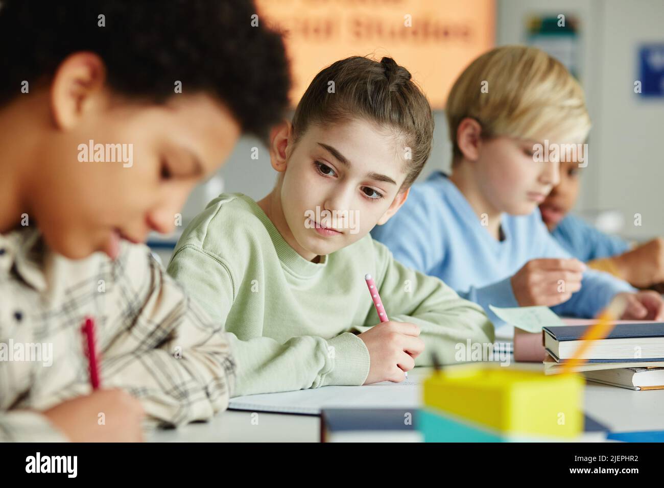 Girl cheating test hi-res stock photography and images - Alamy