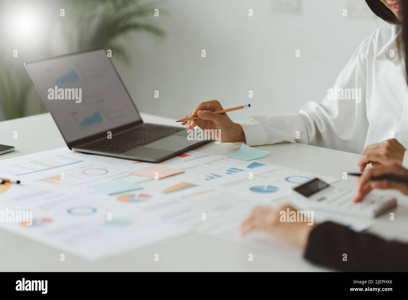 Group of Business woman and Accountant checking data document for ...