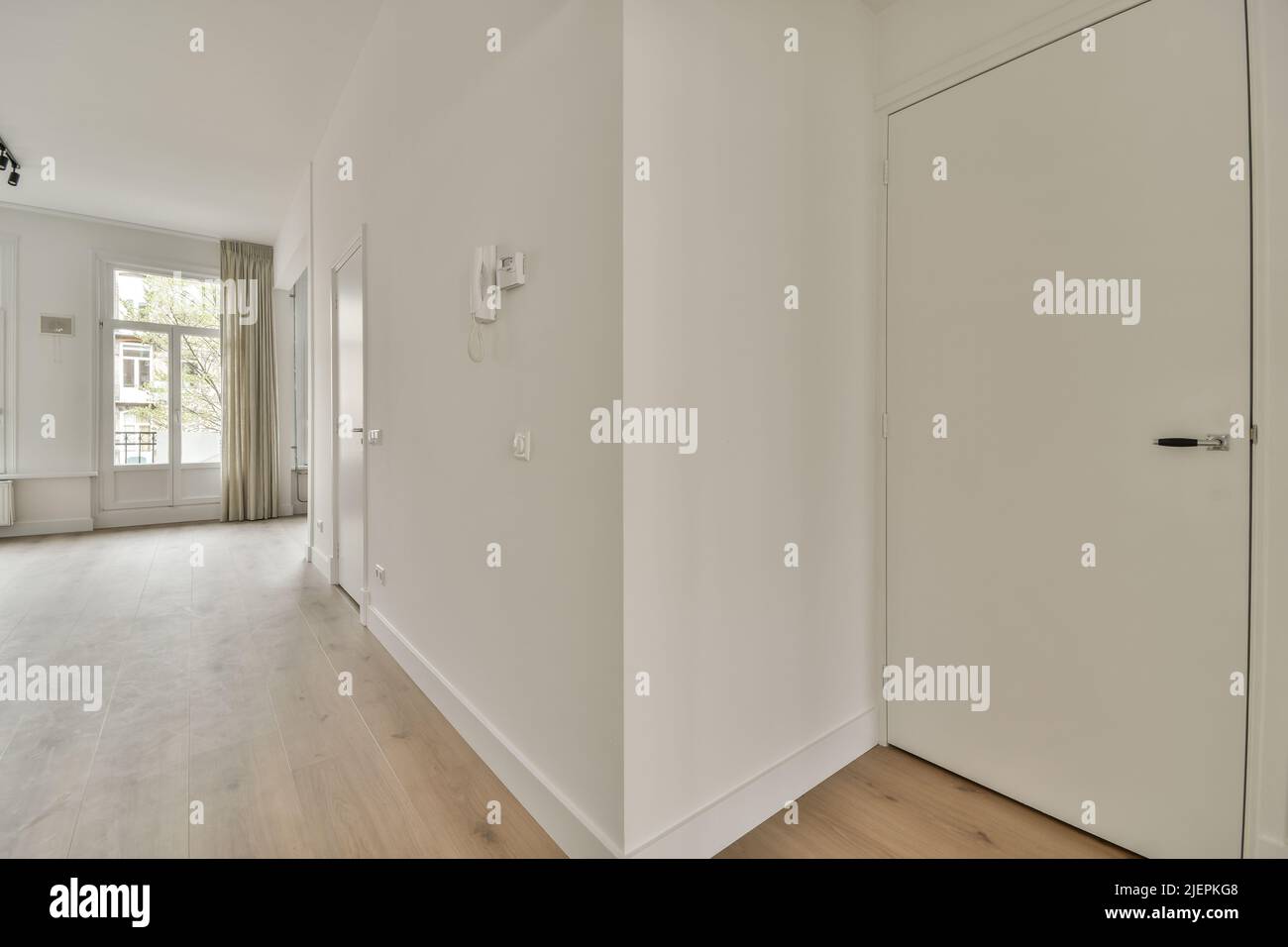 Interior of empty modern apartment with geometric design with entrance ...