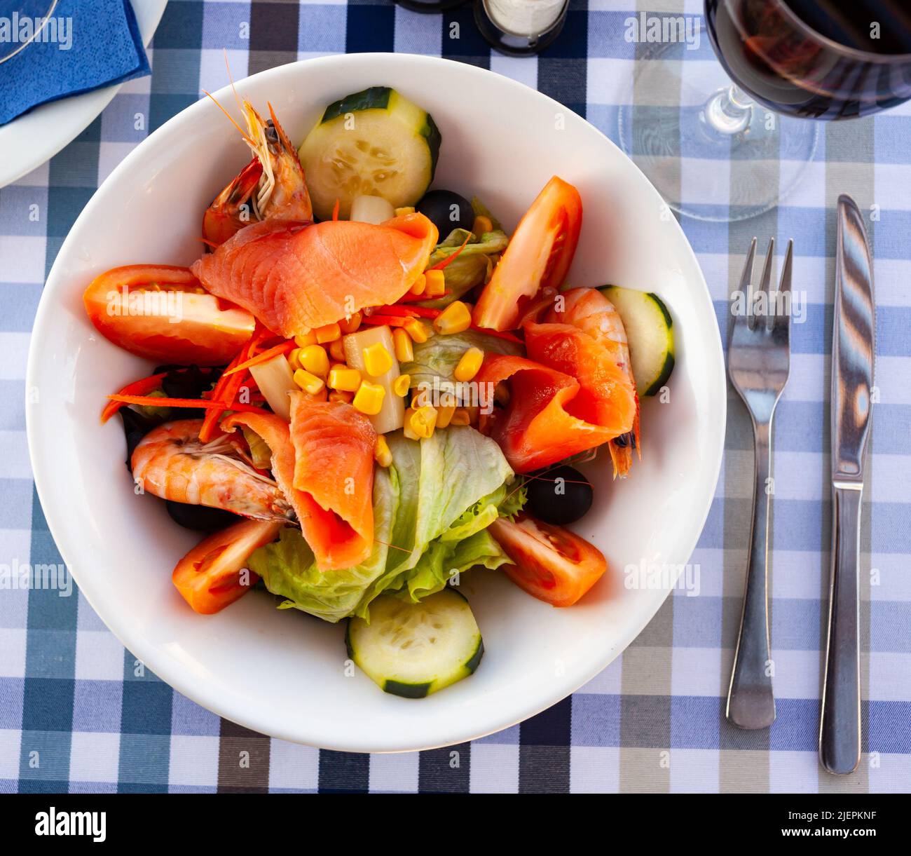 Ensalada de gambas - salad with salmon, shrimp and vegetables. Spanish ...