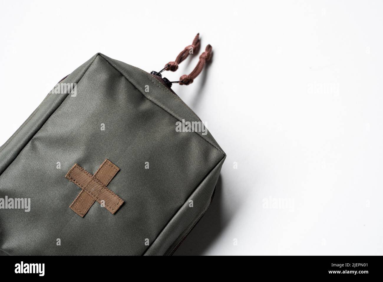 Army first aid kits on white background Stock Photo - Alamy