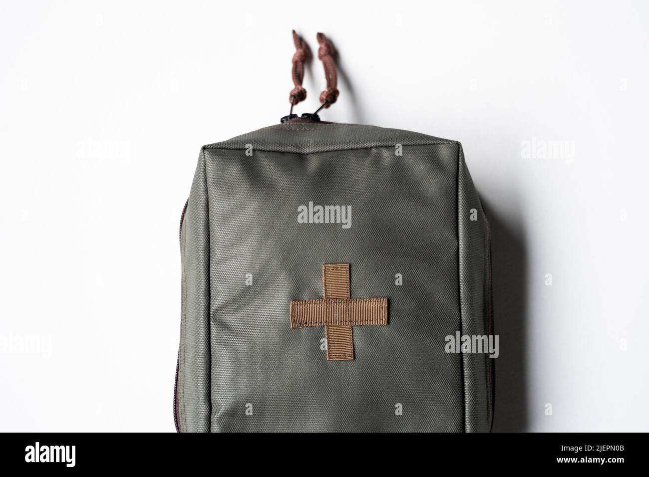 Army first aid kits on white background Stock Photo - Alamy