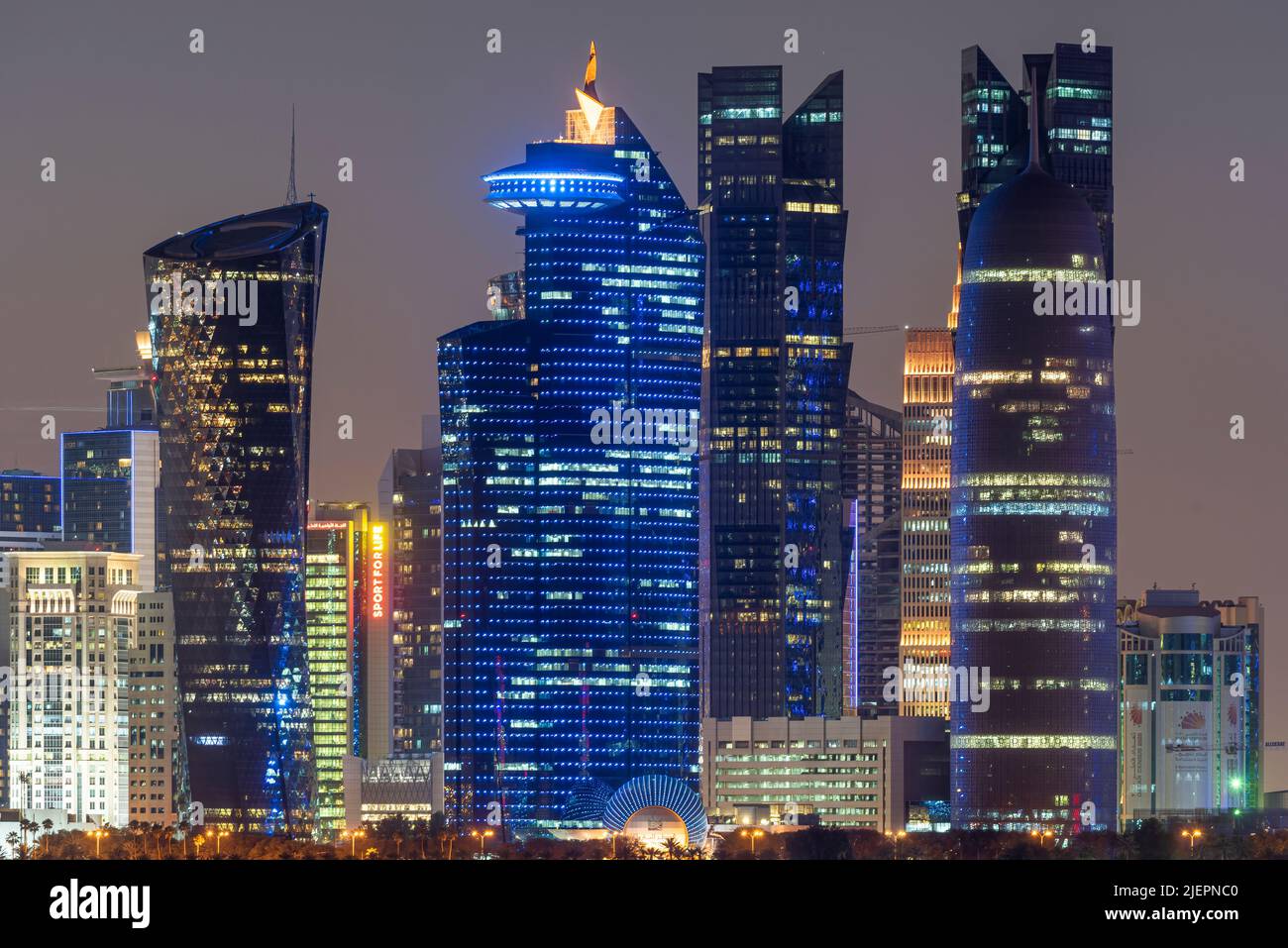 Beautiful sunset view of west bay Doha skyline. financial hub of Qatar ...