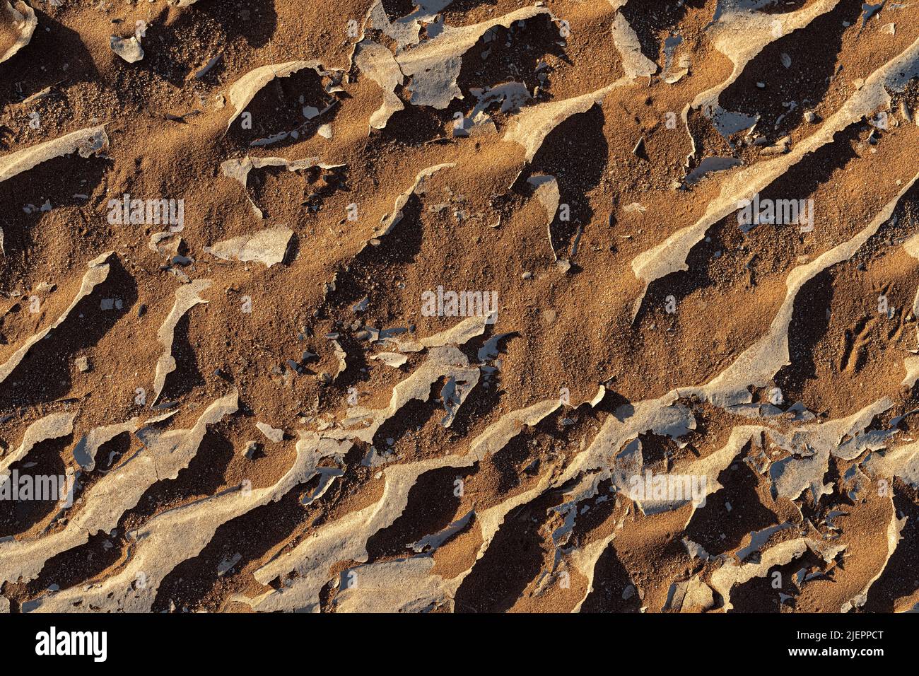 A background image of red sand in the dry Stock Photo - Alamy