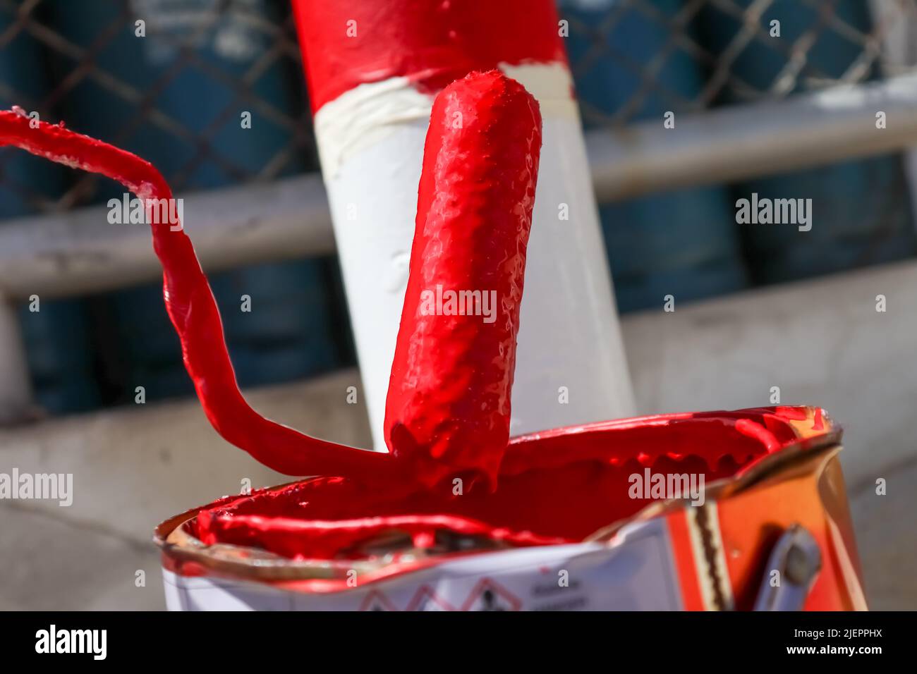 Red color for the paint job in the industry Stock Photo - Alamy