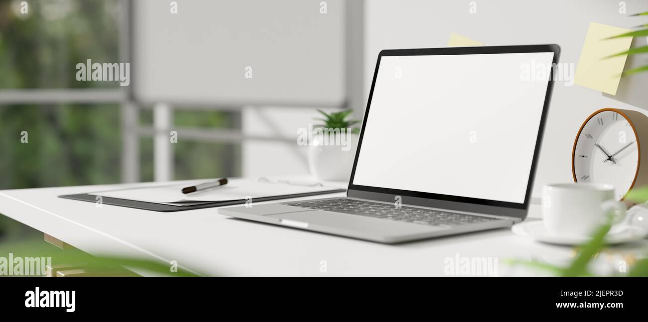 Close-up image, Modern white office desk with portable notebook laptop ...