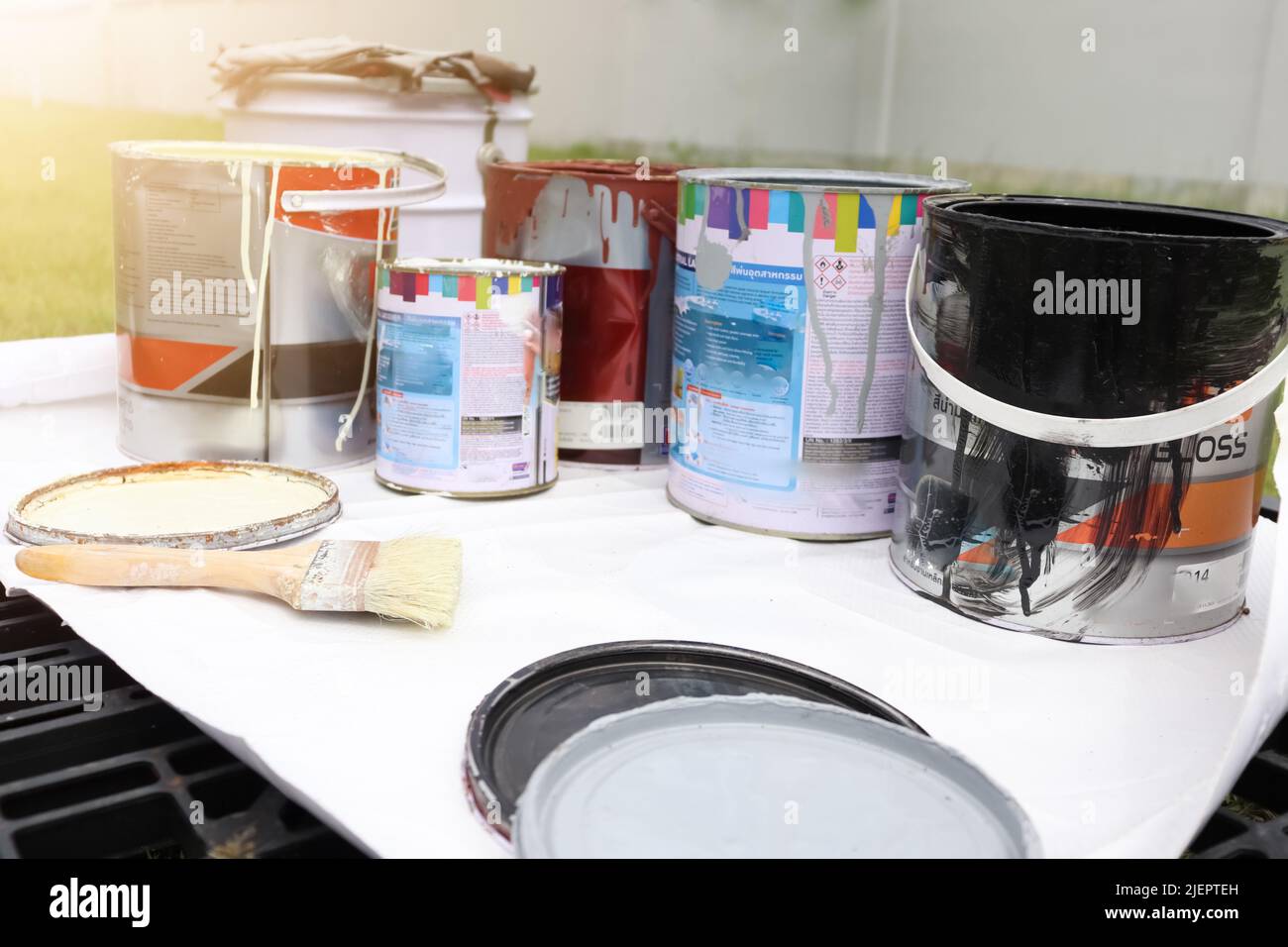Old Chemical waste from paint work in the industry Stock Photo - Alamy