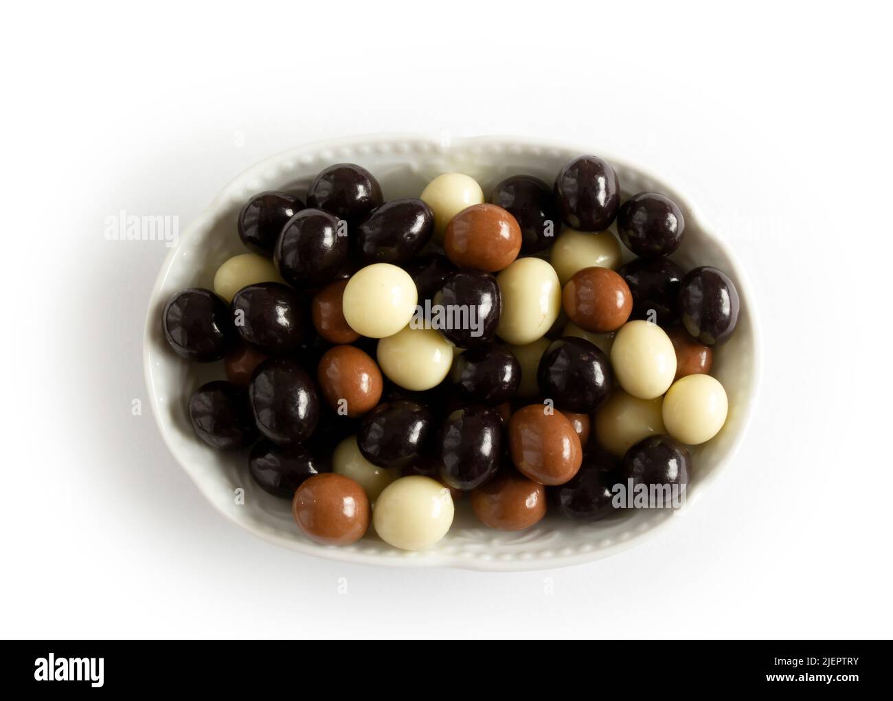 Chocolate covered hazelnuts. Chocolate balls Stock Photo - Alamy