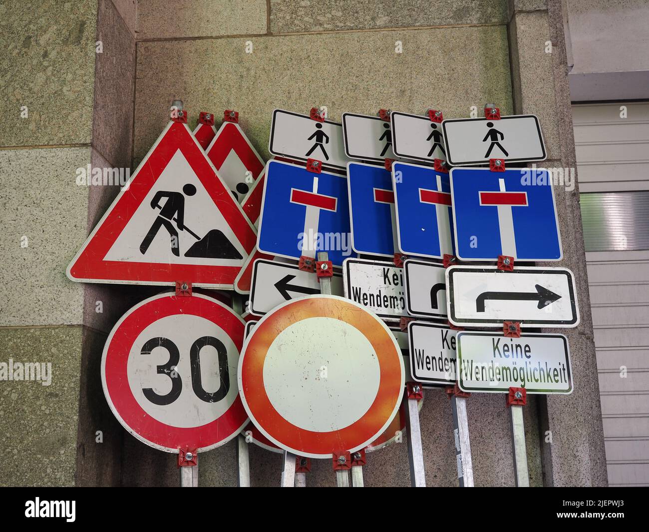 many German signs including no parking and no stopping, no way and ...