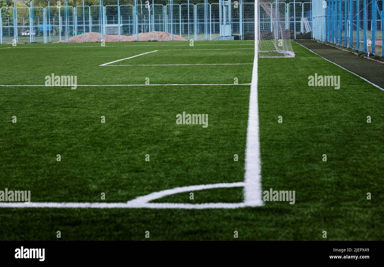 empty football field. Artificial turf of soccer football field with ...