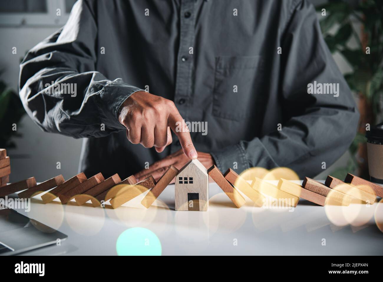 Business risk plan real estate protection. Man hand blocks wood block ...