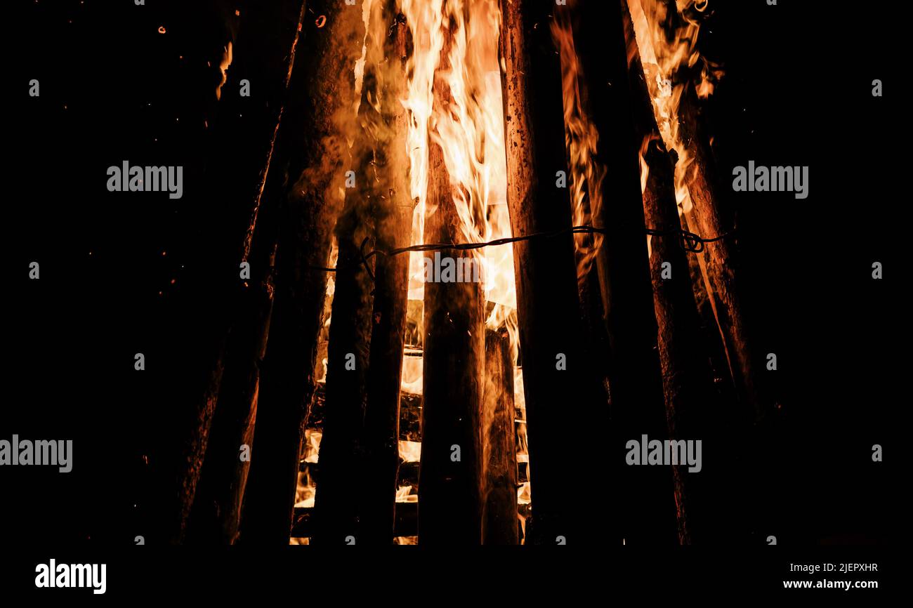 the bonfire burns in the night. Tourist fire in the forest. Texture of ...
