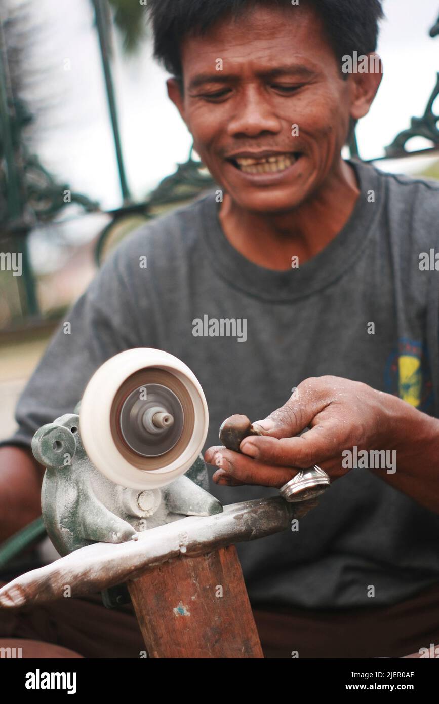 Asian people craftsman grinding gemstone hi-res stock photography and ...