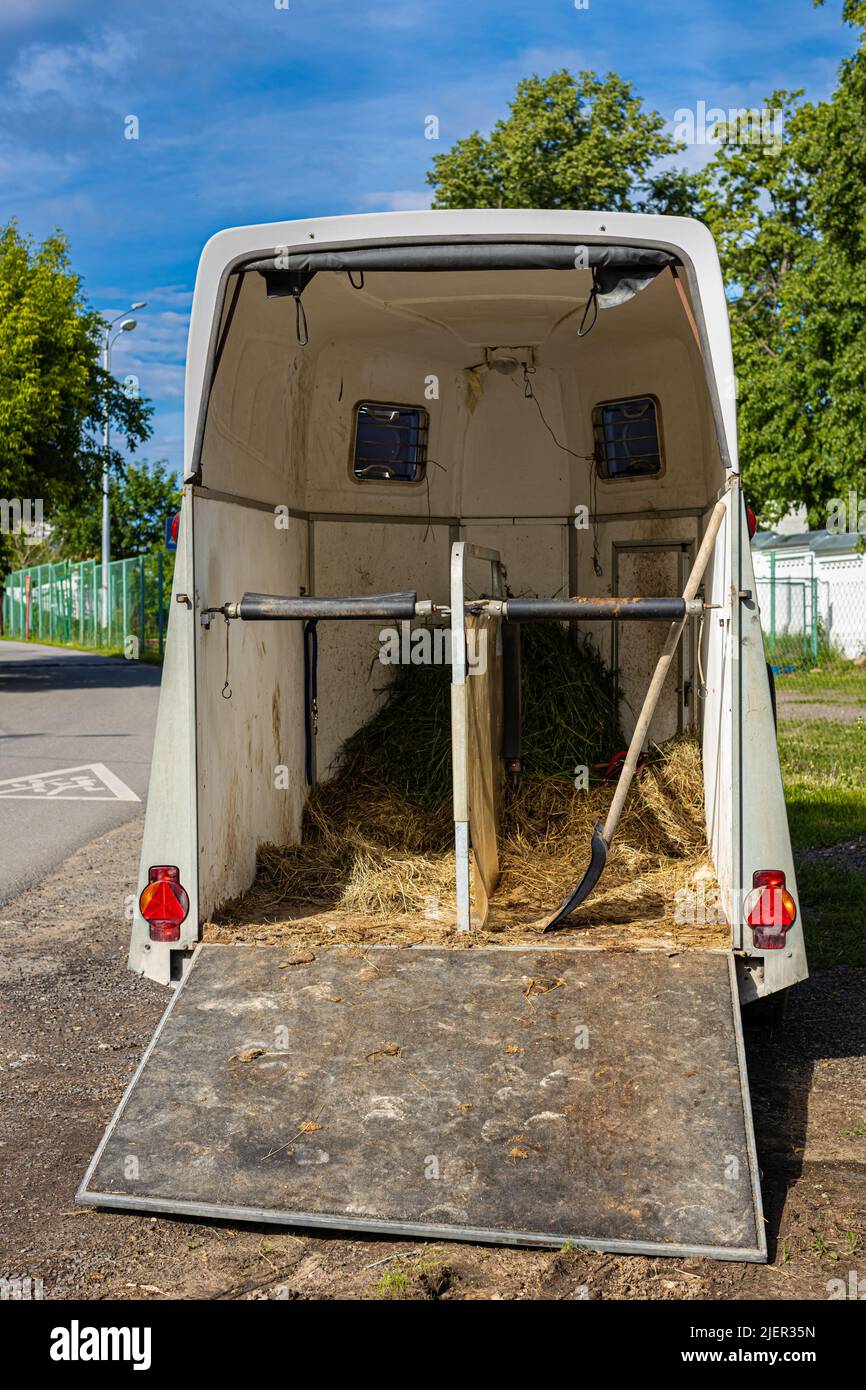 Moscow, Russia - June 18, 2022: trailer for transporting horses stands ...