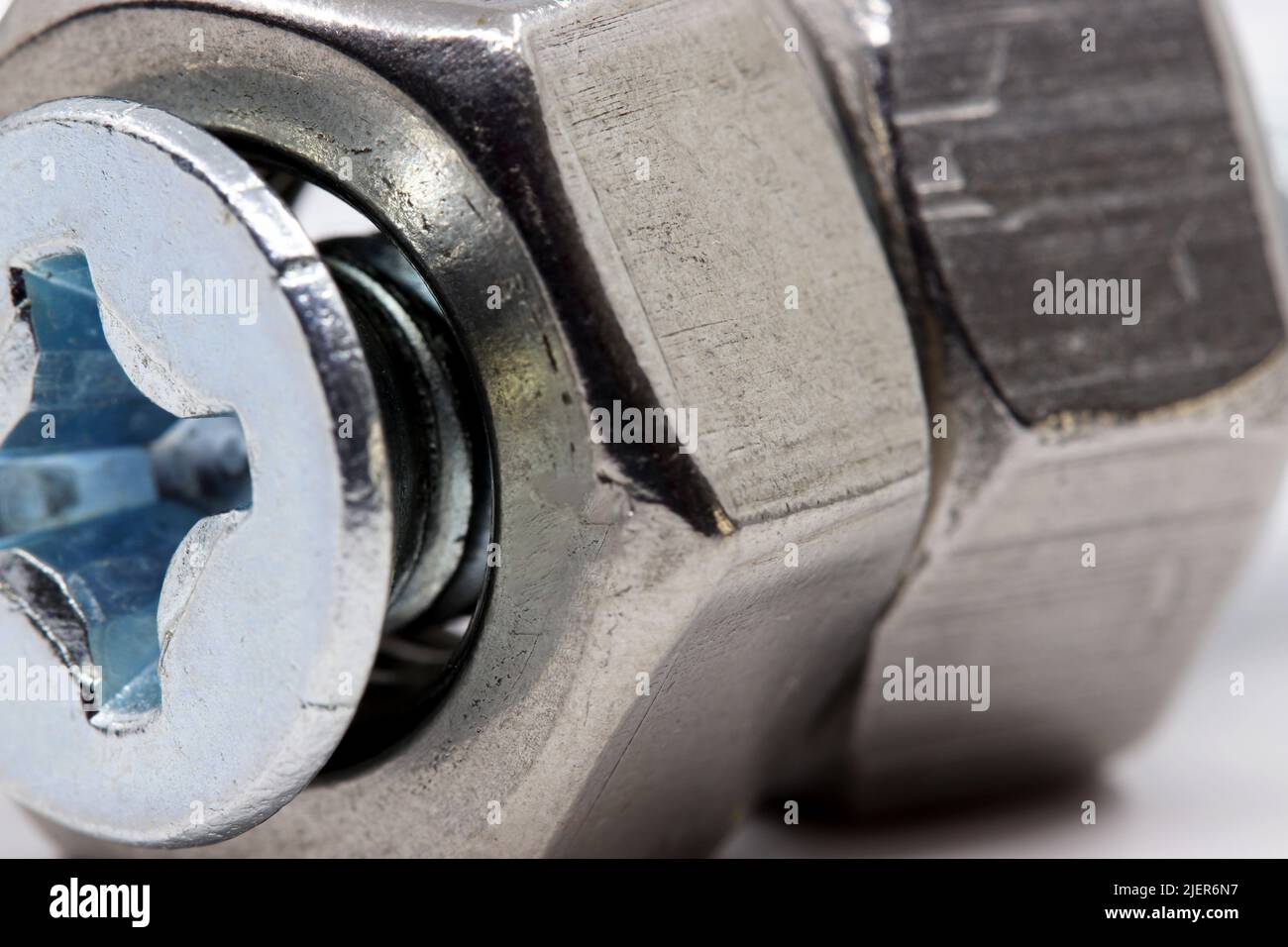 Close-up nuts and bolts isolated on white background Stock Photo - Alamy