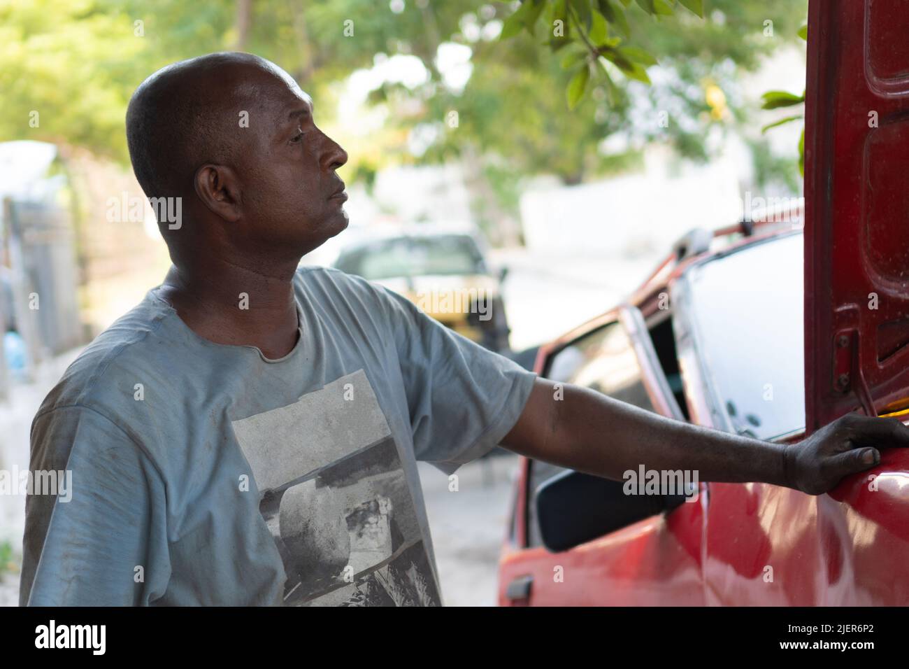 Mechanic checking and repairing the car. Car auto services concepts ...